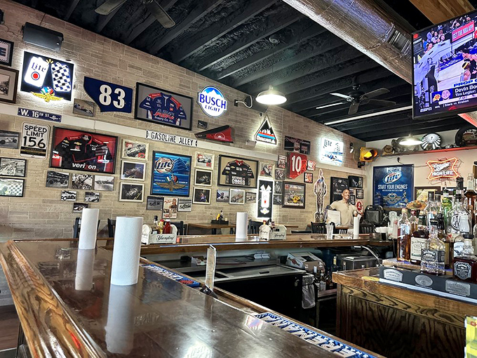 Racing memorabilia meets cozy pub vibes. It's like Speed Racer and Cheers had a baby, and that baby serves amazing wings.