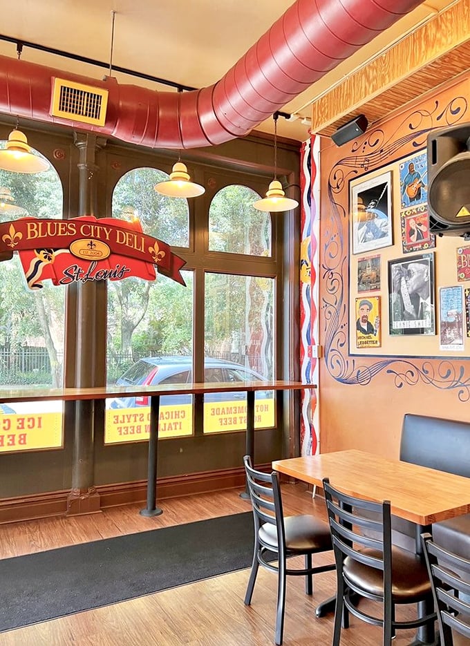 Morning light streams through windows beneath that signature burgundy duct work&mdash;a reminder that beauty exists in both sandwiches and spaces.