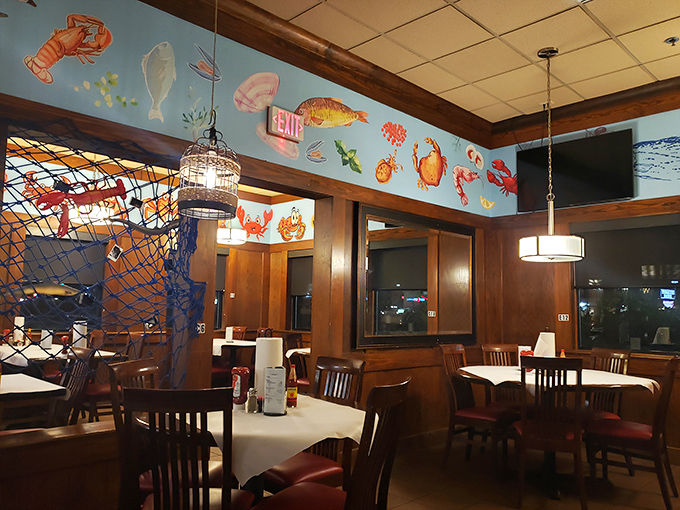Nautical chic meets comfort! The restaurant's cozy interior, with its fishing net accents, sets the stage for your seafood adventure.