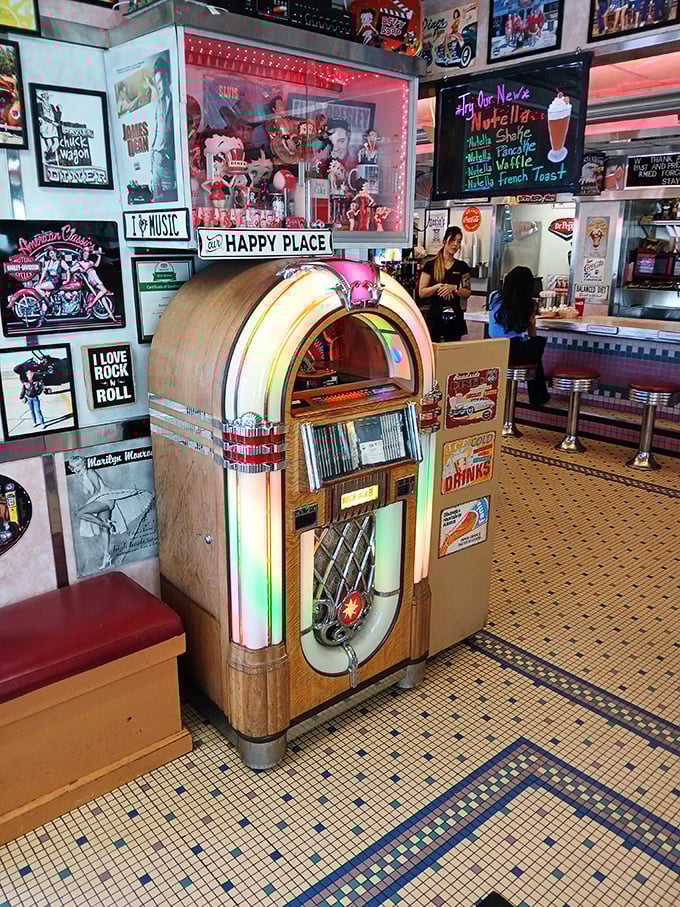 Jukebox hero! This musical marvel is ready to soundtrack your meal with hits from back when guitars were king and hair was high.
