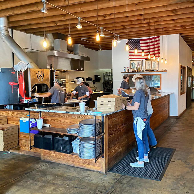Where the magic happens. This open kitchen is like a front-row seat to the best show in town&mdash;Pizza: The Musical.