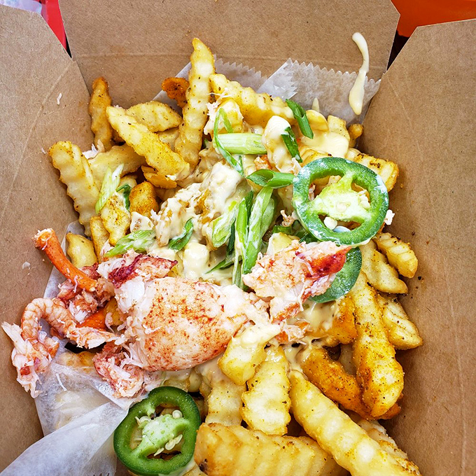 Fries that put the 'fun' in seafood! These La La Lobster Fries are a carnival of flavors, topped with enough lobster to make Neptune jealous.