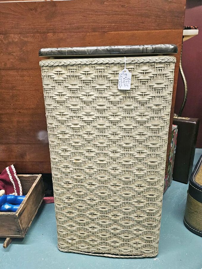 Woven with care and nostalgia, this mid-century hamper could hold your laundry &ndash; or your vintage dreams. Either way, it's a basket case of cool.