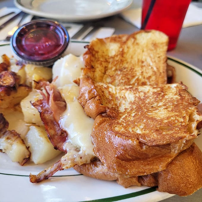 This Monte Cristo isn't playing around&mdash;golden-fried bread embracing ham and cheese with the commitment we all wish our relationships had.