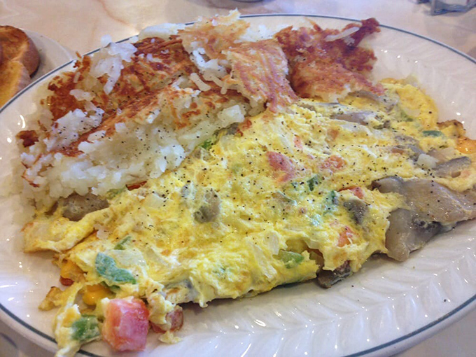 Omelette you finish, but this might be one of the best breakfast plates of all time. Fluffy eggs meet crispy potatoes in a match made in diner heaven.