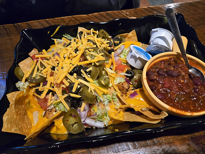 "Nacho average appetizer!" This mountain of chips, cheese, and toppings is like edible Jenga &ndash; delicious from the first bite to the last.