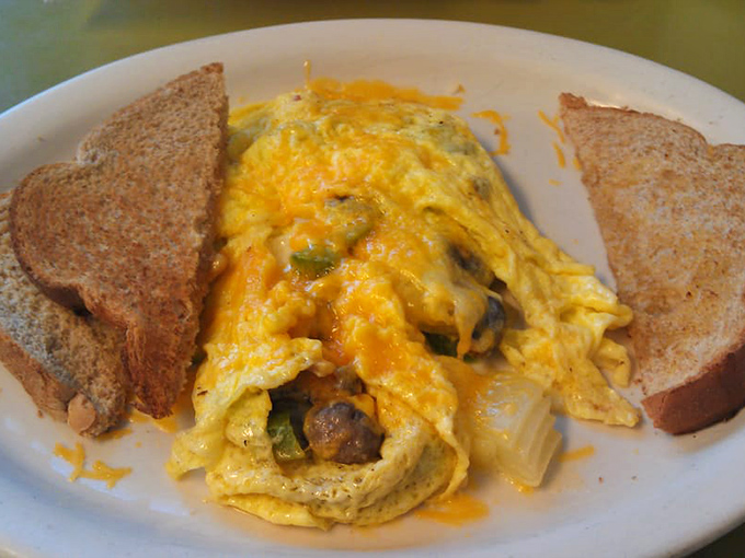 An omelet that's all business in the front, party in the middle! Stuffed with veggies and cheese, it's a breakfast fiesta wrapped in an egg blanket.