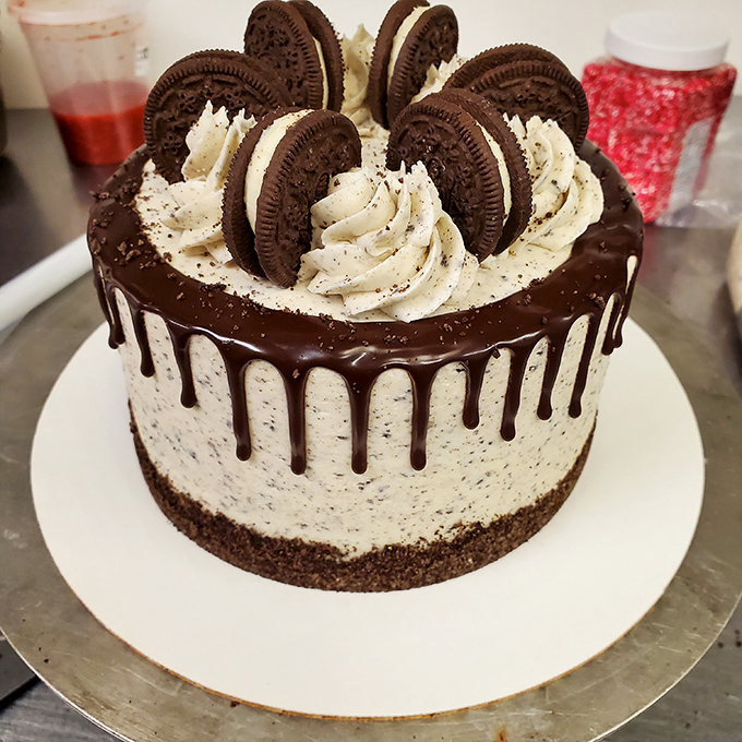 Oreo cake that defies gravity and dairy! It's a towering testament to the power of vegan baking (and a chocoholic's dream).