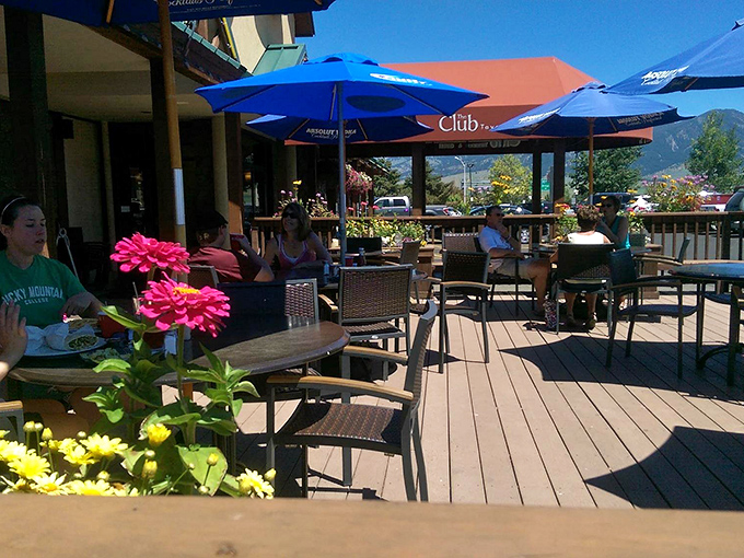 Alfresco dining at its finest. This charming outdoor seating area is the perfect spot to enjoy a meal, soak up some Montana sunshine, and maybe even make a new friend or two.