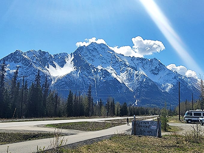 Mountains meet munchies! This sign points the way to where natural wonders and culinary delights collide.