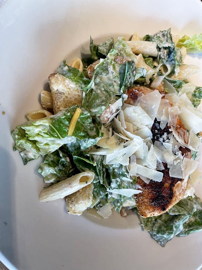 This isn't just a salad; it's a textural symphony of crisp greens, tender pasta, and perfectly flaked salmon.