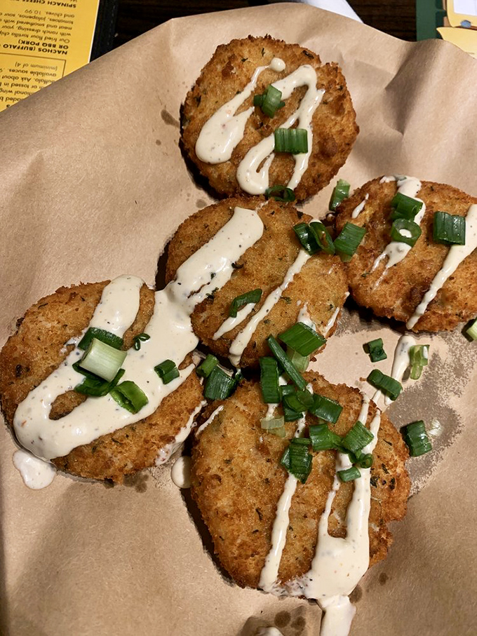 Golden-brown perfection! These crispy potato cakes are what hash brown dreams are made of, elevated with a dollop of cool sauce.