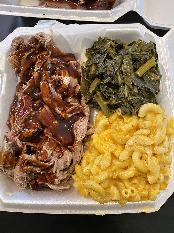 Pulled pork so good, it'll make you want to pull up a chair and stay awhile. Paired with collards and mac, it's a Southern symphony.