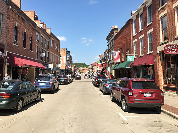 Main Street: Where every storefront tells a story, every awning has a tale, and every parked car is probably hiding some mouthwatering local treat.