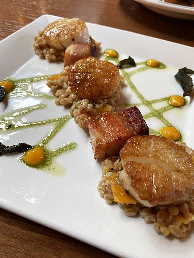 Surf meets turf in a culinary tango. These scallops and pork belly are the Fred and Ginger of your dinner plate.