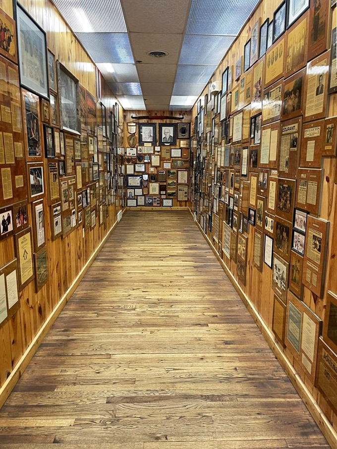 Shhh... you've stumbled upon Wall Drug's memory lane. This corridor of countless photos and clippings is like Instagram's great-grandpa, telling tales of road trips past.