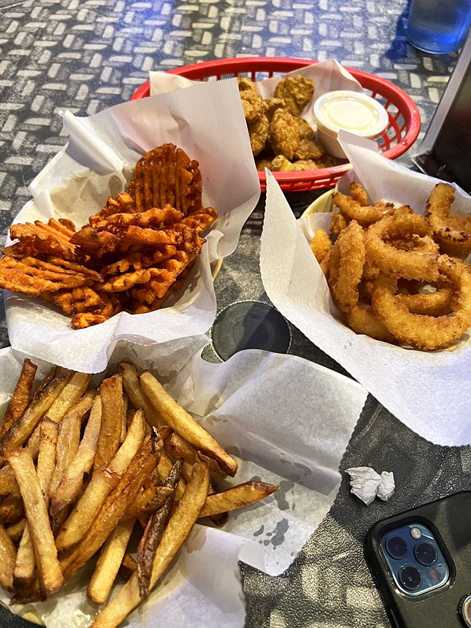 A symphony of sides! From crispy fries to crunchy onion rings, these supporting actors deserve a standing ovation of their own.