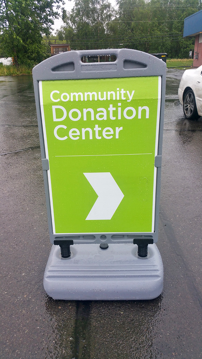 Follow the green brick road! This sign points the way to where your donations become someone else's treasures.