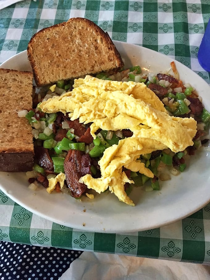 A skillet that's not messing around. Packed with flavor and paired with hearty toast, it's like a farmer's breakfast got a gourmet makeover.