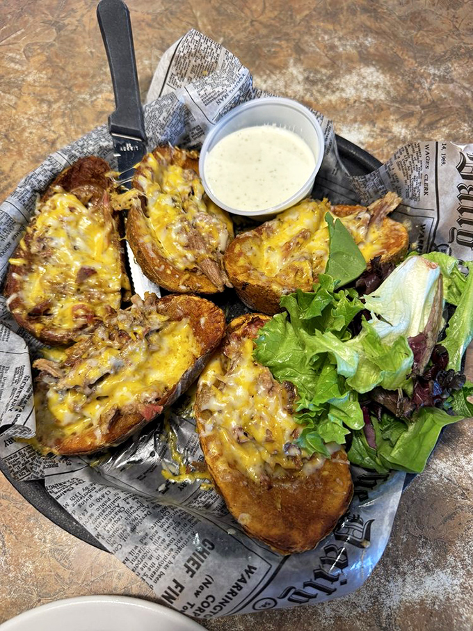 Potato skins elevated from bar food to barbecue art form. That melted cheese blanket covering pulled pork is what comfort food dreams are made of.