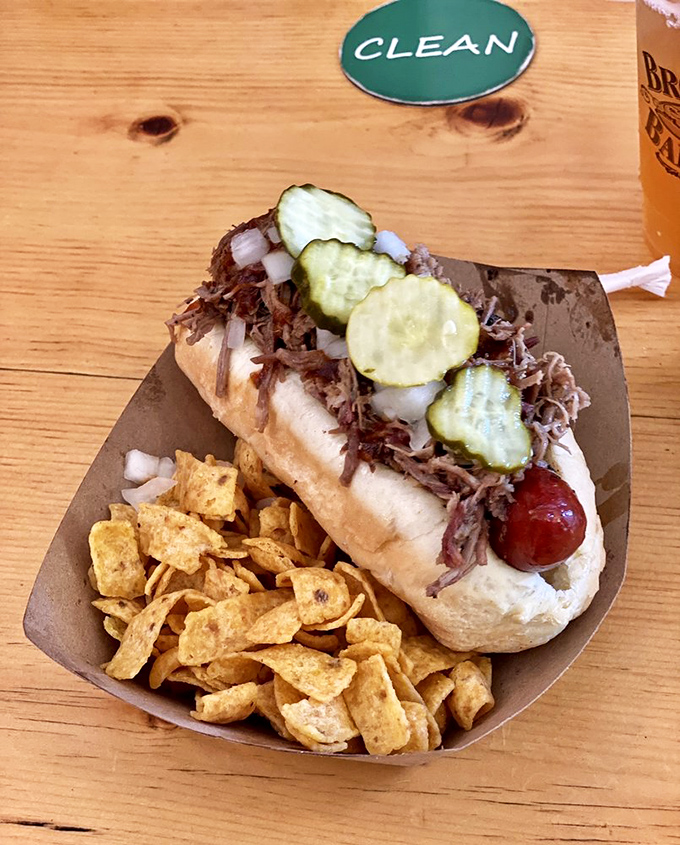 The sandwich that requires both hands and a strategy. This loaded beauty with pickles, onions and pulled meat demands your full attention.