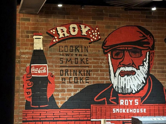Wall art that captures the essence of Hutchins: Good food, good drinks, and a whole lot of personality. Roy's got the right idea!
