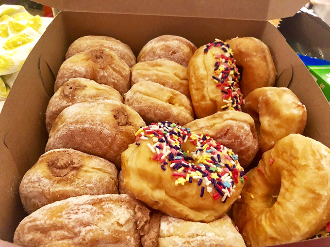 A box of joy in cardboard form. The only math problem worth solving: how many can you eat before sharing becomes mandatory?