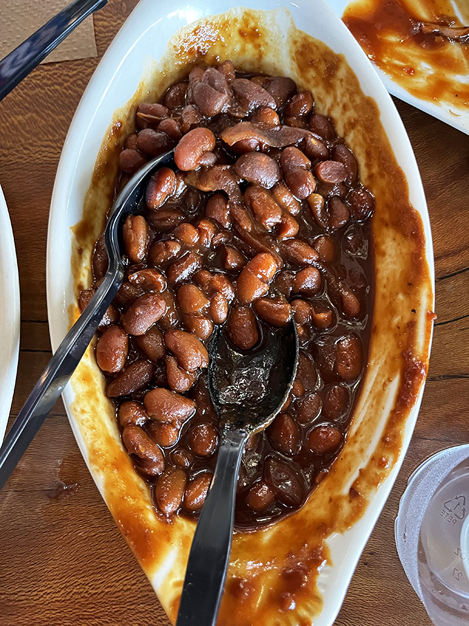 These aren't your average baked beans; they're a sweet and savory flavor explosion that'll make you rethink side dish priorities.