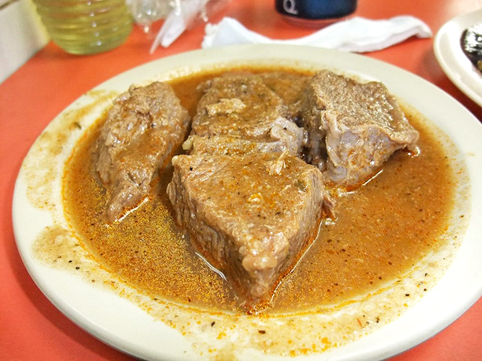 This isn't just beef stew; it's a warm, savory hug in a bowl. Perfect for those days when you need comfort food with a Cuban accent.