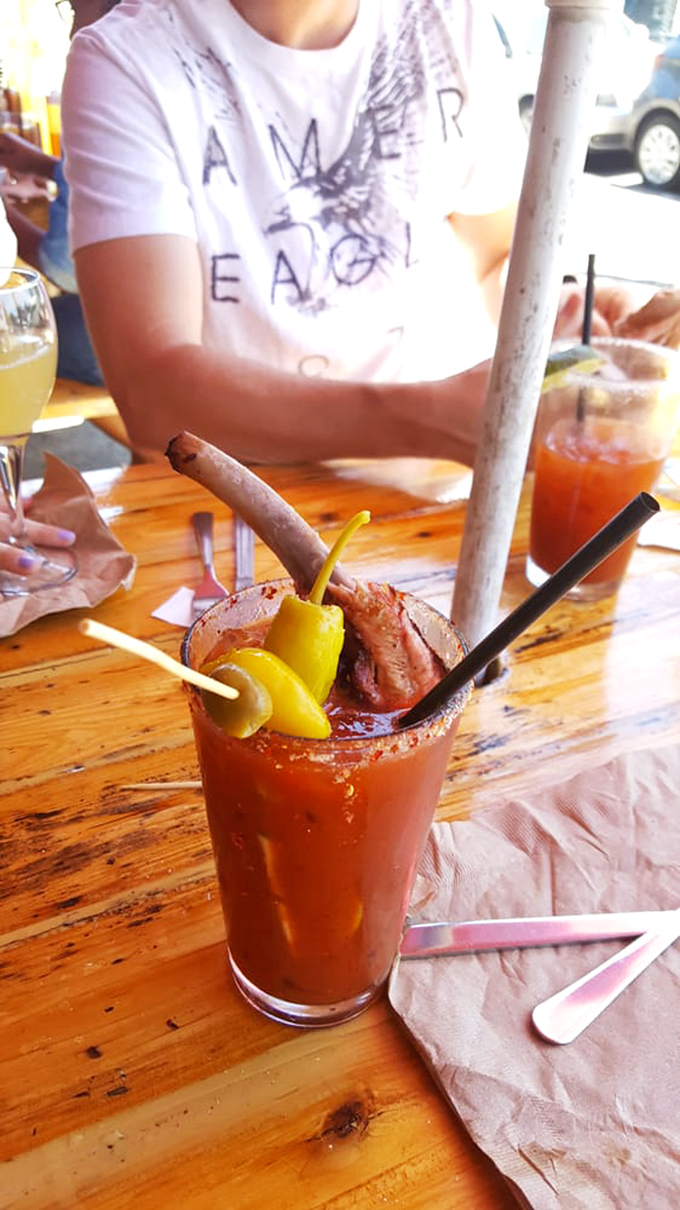 Is it a drink or a meal? This Bloody Mary comes locked and loaded with more garnishes than a Christmas tree. Sip, munch, repeat!