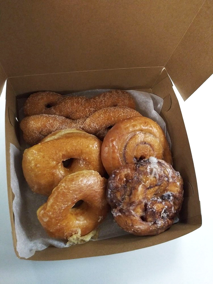 Treasure chest of treats! This box is like Pandora's pastry paradise - once opened, there's no going back. Sharing is caring, but we won't judge.