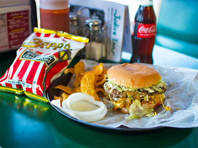 Meet the cheeseburger of your dreams! Melty cheese, crisp veggies, and a patty that's worth crossing state lines for.