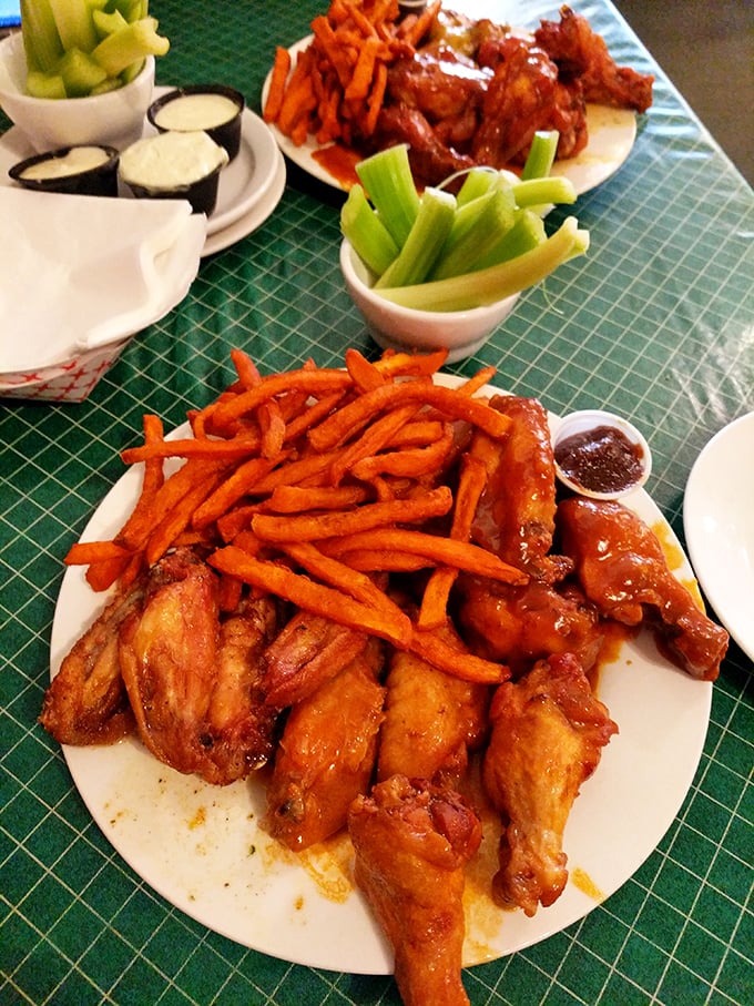 Wings so good, they'll make you consider growing your own. Paired with crispy carrot fries, it's a plate that screams "Netflix and chill" – emphasis on the chill.