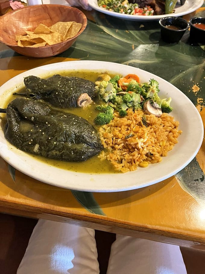 Chili rellenos: where peppers go to fulfill their cheesy, saucy destinies. It's like a spa day for your taste buds!