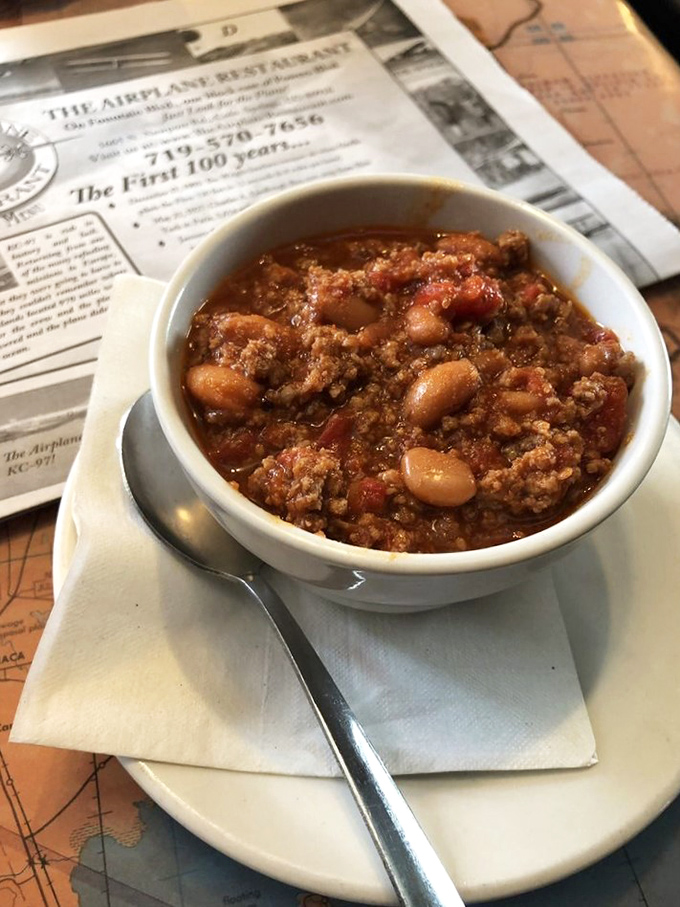 Chili that packs more heat than a jet engine! Served with a side of aviation history, it's comfort food that'll make your taste buds soar.