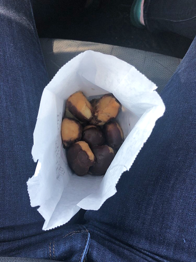 Chocolate-covered happiness! These donut holes are like tiny planets in a delicious, sugar-coated solar system.