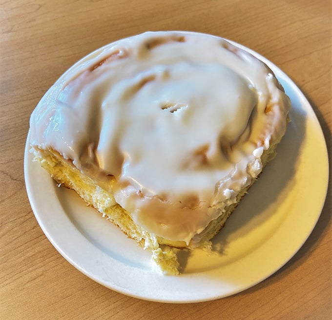 Cinnamon roll or edible hug? This gooey, glazed masterpiece is what breakfast dreams are made of. Pair it with coffee for a perfect morning.