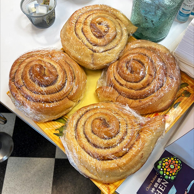 These cinnamon rolls are so big, they have their own area code. Forget six-pack abs, these beauties are aiming for the one-pack.