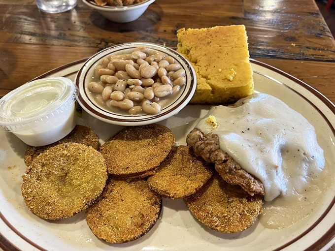Fried green tomatoes: proof that sometimes the best things in life are green, crispy, and dipped in ranch dressing.