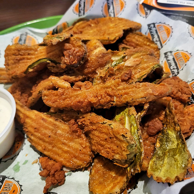 Crispy, tangy, and utterly addictive! These fried pickles are like the potato chip's cooler cousin &ndash; once you pop, you just can't stop. Dip at your own risk!