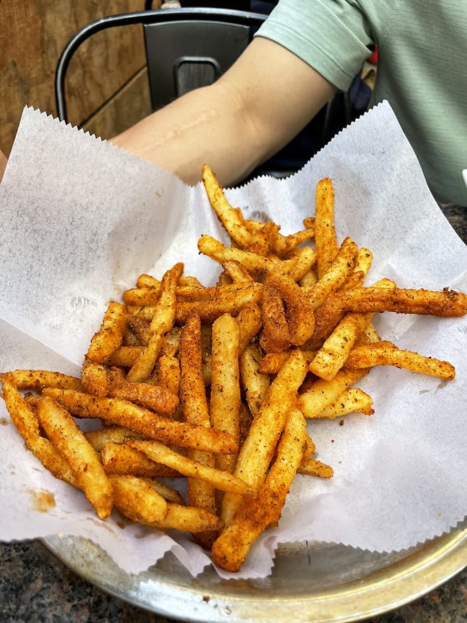 Fry, oh my! These crispy, seasoned fries aren't just a side dish, they're a supporting actor worthy of a culinary Oscar.