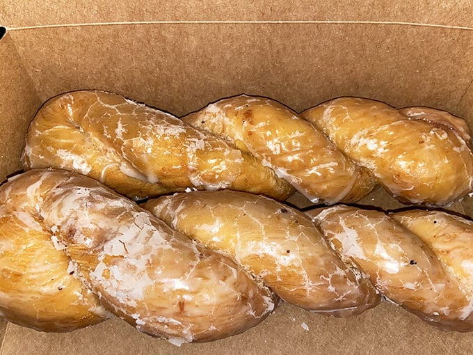 Twisted glazed perfection that makes you wonder why anyone bothers with straight donuts. These braided beauties prove that life is better with a little twist.