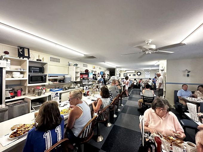 Where strangers become friends over shared plates and refilled mugs. This bustling interior is a testament to the timeless appeal of good food and warm hospitality.