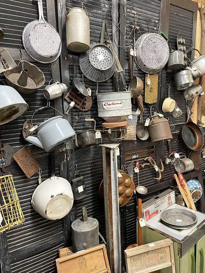 The wall of vintage kitchenware&mdash;where your grandmother's potato masher hangs alongside tools modern cooks can't even identify.