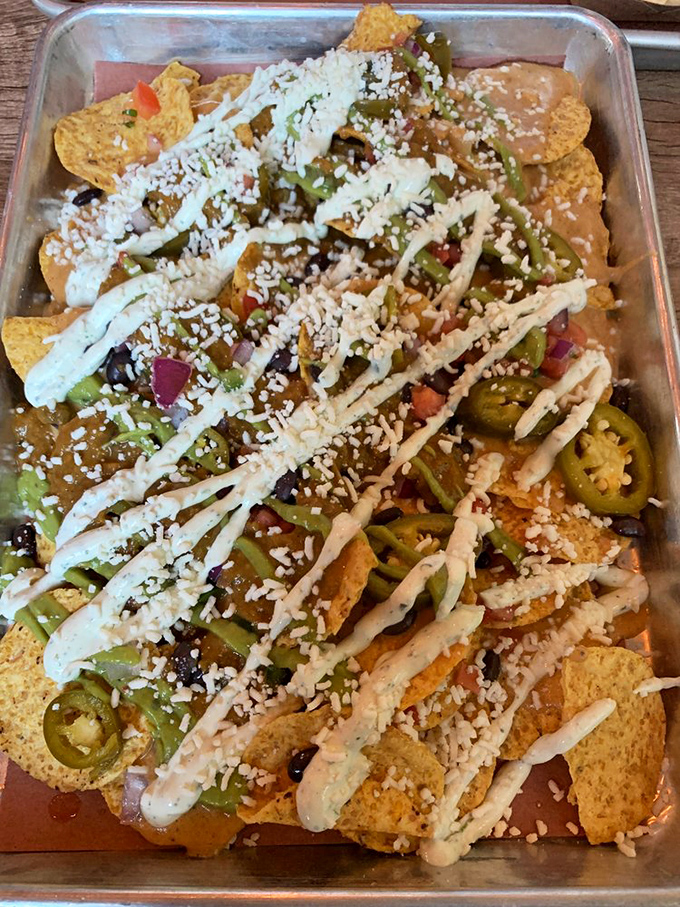 Nachos that put the 'fun' in funky! This mountain of chips, cheese, and toppings is like a fiesta on a plate. Bring your appetite and leave your dignity at the door.