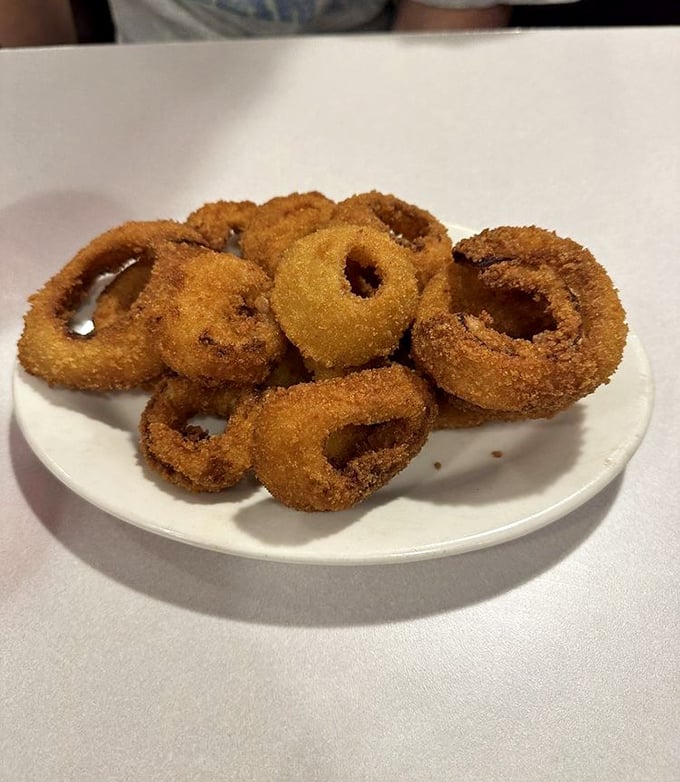 Onion rings so perfectly golden, they deserve their own Olympic medal. Crunchy, savory, and utterly irresistible &ndash; resistance is futile!