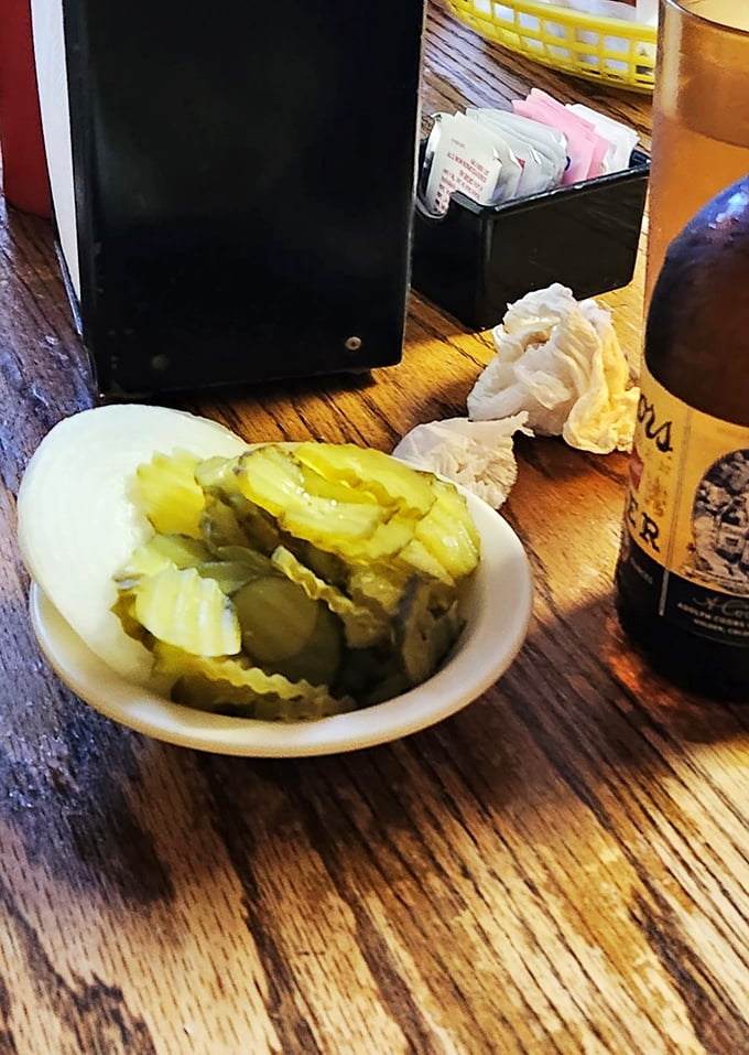 Pucker up, buttercup! These zesty pickles are the perfect dance partners for Bud's beefy stars, adding a tangy twirl to every bite.