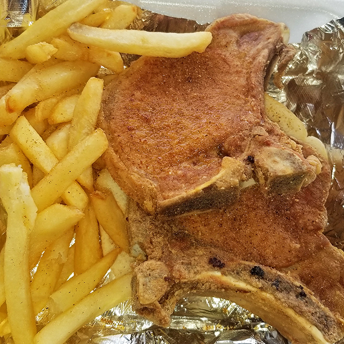 This pork chop is the Schwarzenegger of the pig world - beefy, well-seasoned, and ready to terminate your hunger.