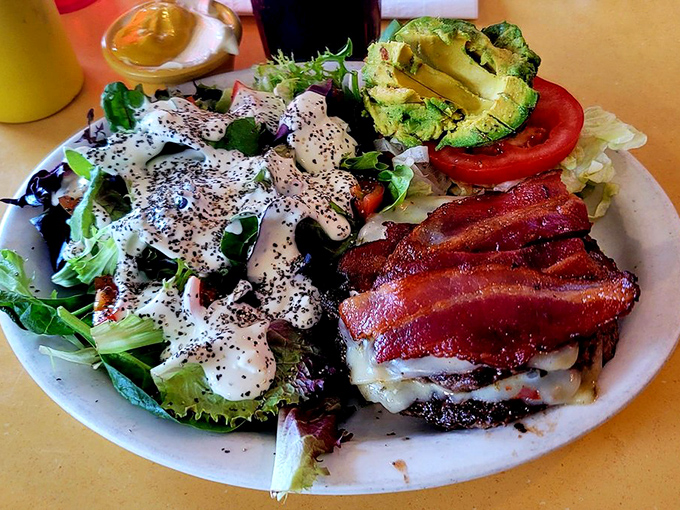 A salad that's not just rabbit food! This plate proves healthy can be hearty, with enough bacon to make even Ron Swanson nod in approval.