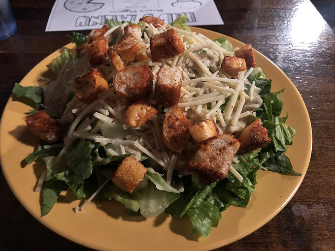 Crouton-crowned and cheese-bedecked, this salad is the opening act that steals the show. Et tu, Caesar?